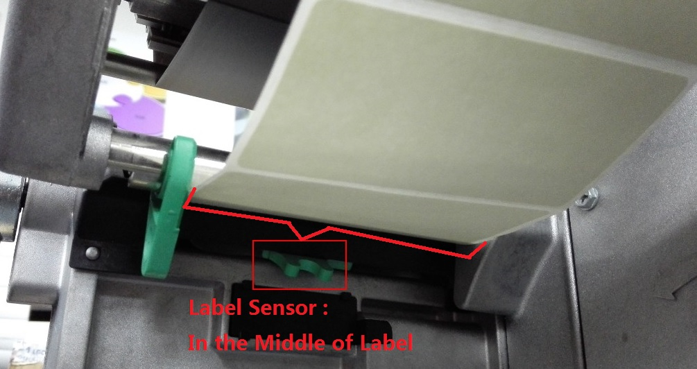 How to install ribbon and labels on the H-Class Printer
